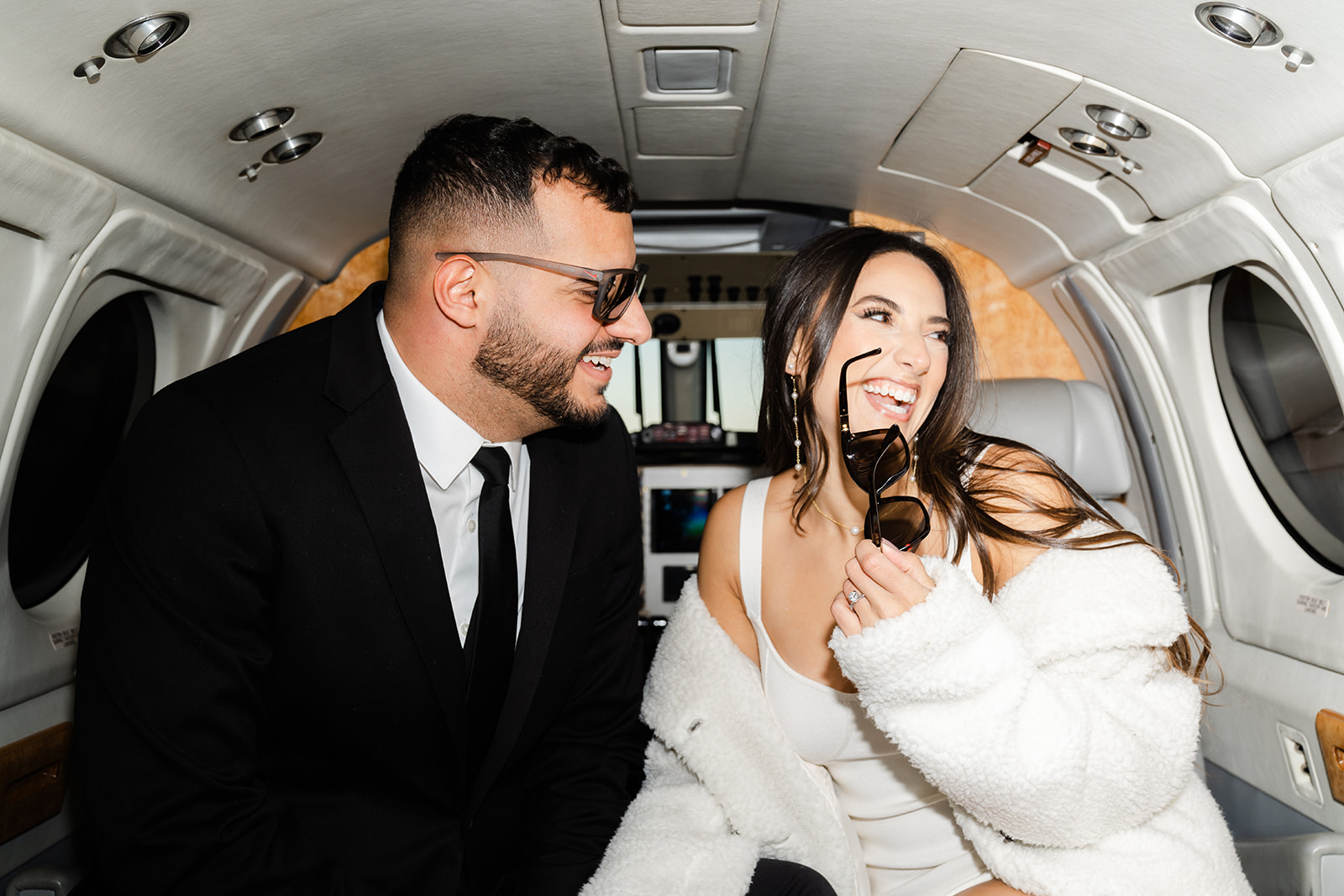 An Epic Private Jet Glam Photoshoot Engagement Session