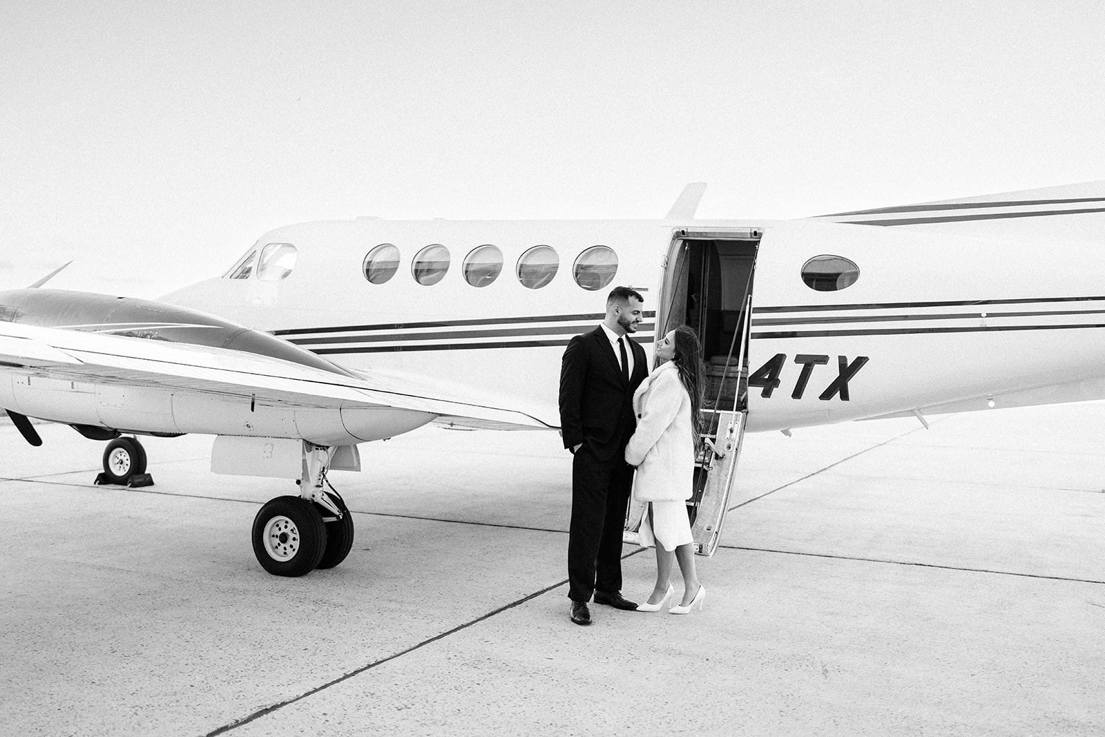 An Epic Private Jet Glam Photoshoot Engagement Session