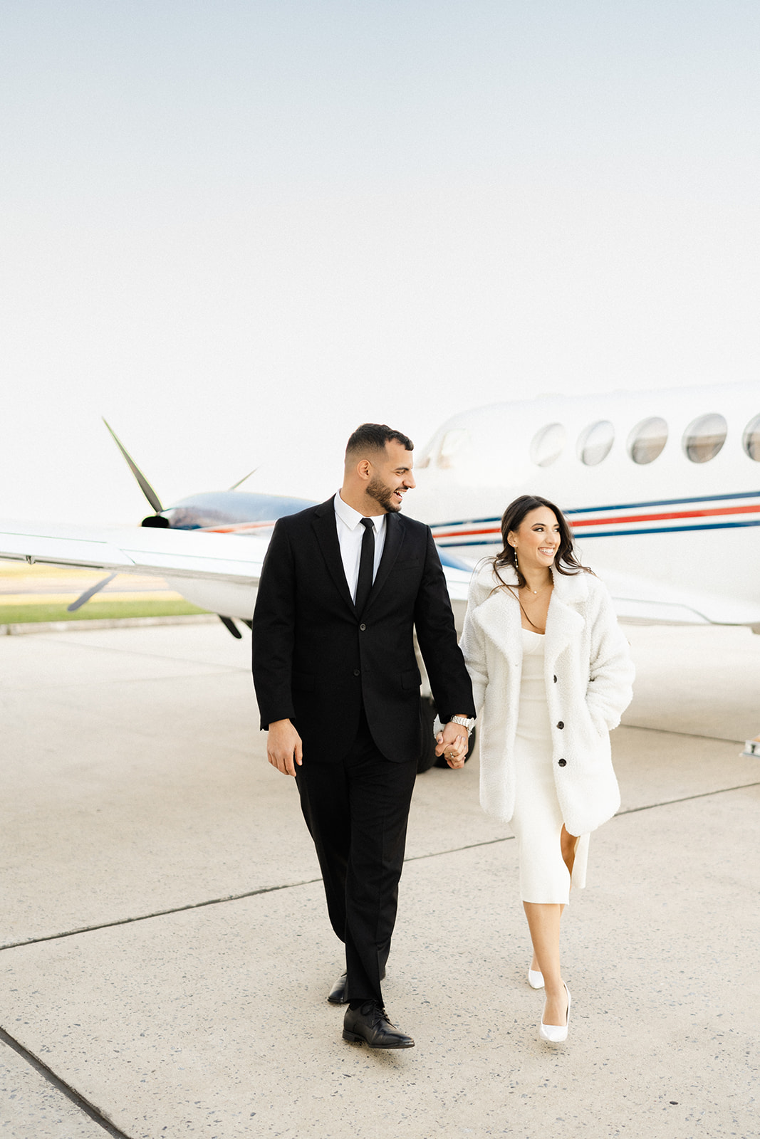 An Epic Private Jet Glam Photoshoot Engagement Session