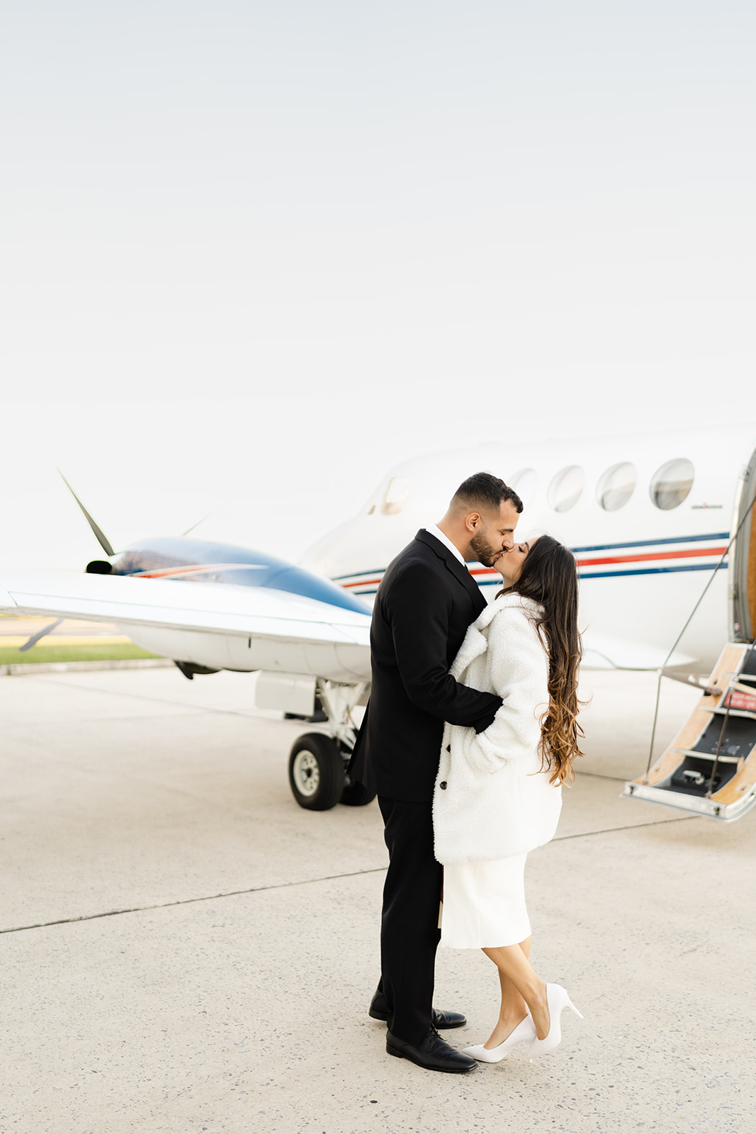 An Epic Private Jet Glam Photoshoot Engagement Session