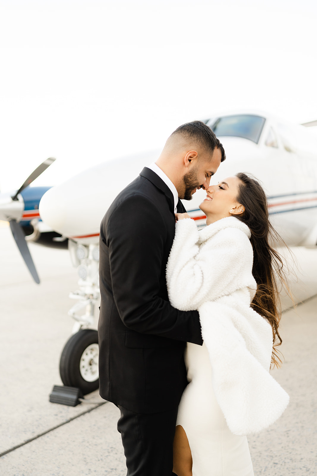 An Epic Private Jet Glam Photoshoot Engagement Session