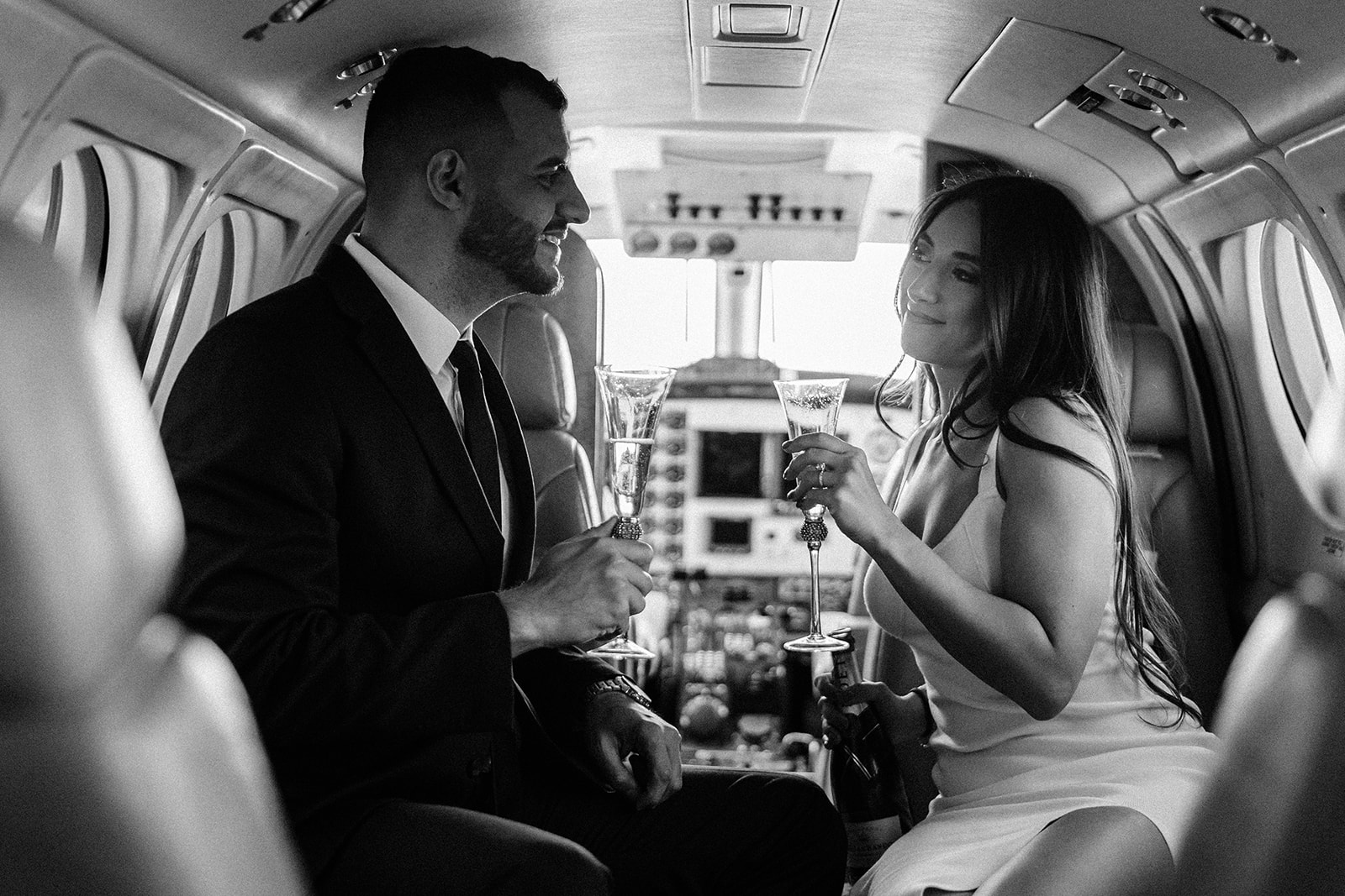 An Epic Private Jet Glam Photoshoot Engagement Session