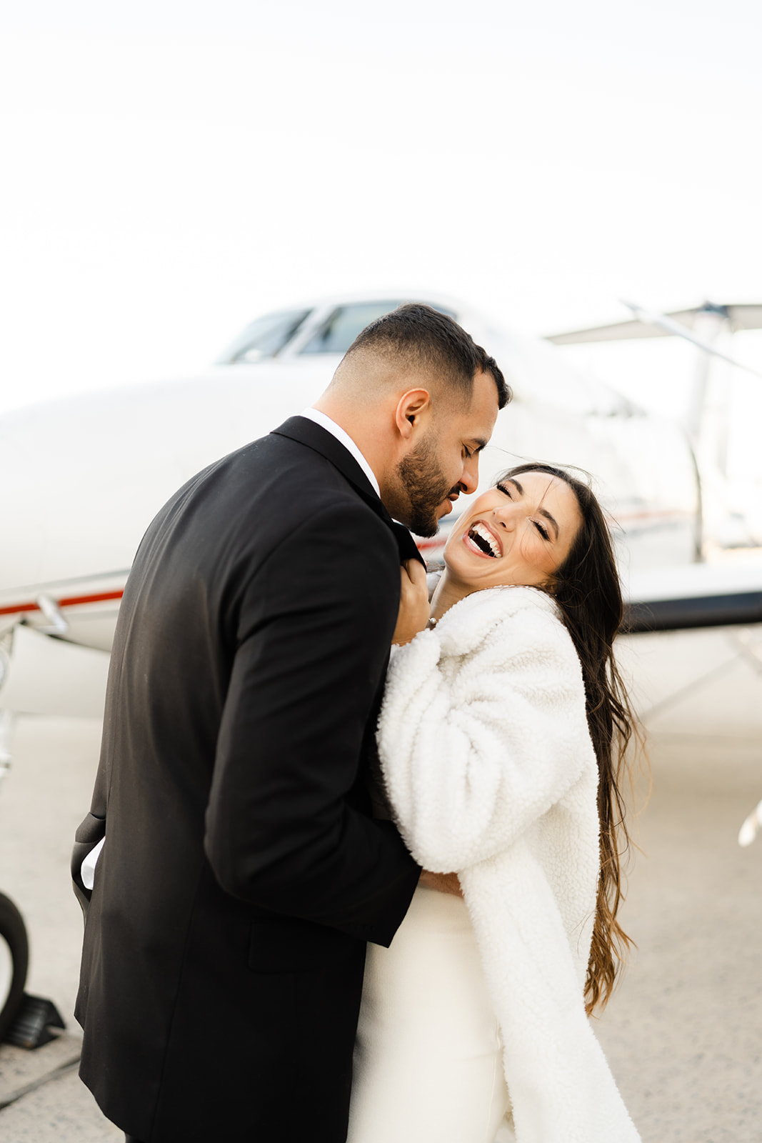 An Epic Private Jet Glam Photoshoot Engagement Session